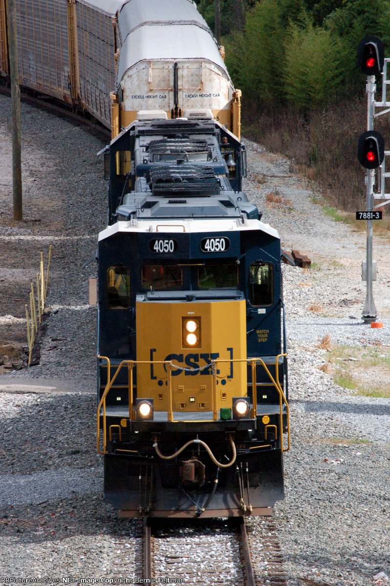 CSX SD40-3 4050 leads train Q282-14 past newly installed signal on the Runaround Track in front ...